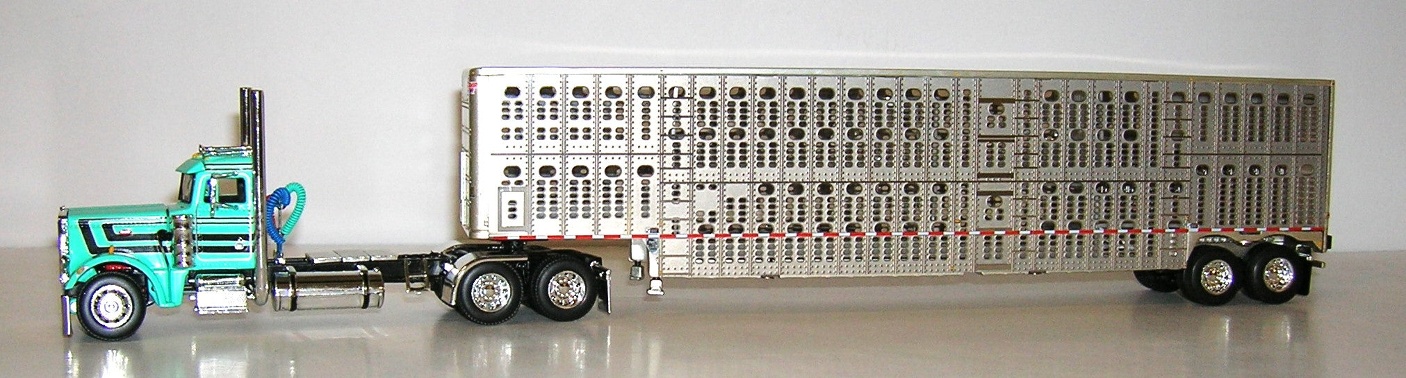 1/64 FIRST GEAR TOY PETERBILT SEMI TRUCK W WILSON CATTLE TRAILER